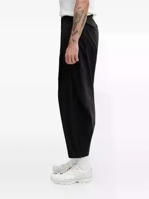 ADER ERROR Pleated Tapered-leg Trousers