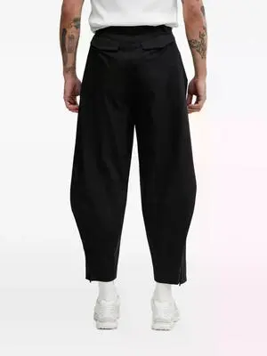 ADER ERROR Pleated Tapered-leg Trousers