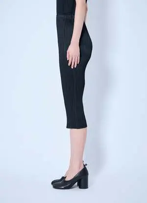 Issey Miyake Mid Rise Pleated Cropped Trousers