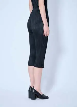 Issey Miyake Mid Rise Pleated Cropped Trousers