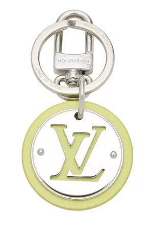 LOUIS VUITTON Cutout Circle Logo Key Holder