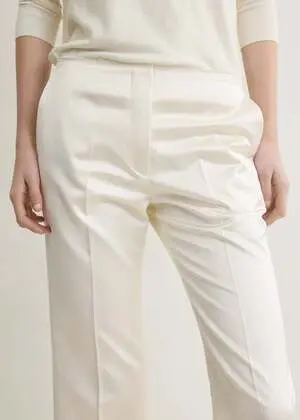 TOTEME Kick Flare Raw-edge Trousers
