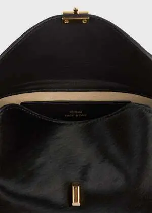 TOTEME Mini T-lock Pony Hair Clutch