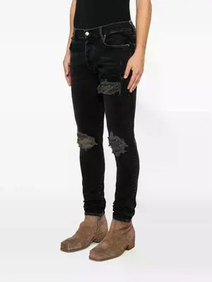 Amiri Distressed Patchwork Jeans