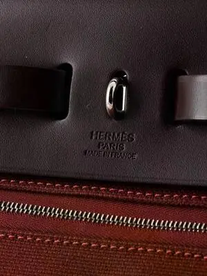 Hermès Herbag Zip Criss Viking Toile And Leather 31 Shoulder Bag - Red