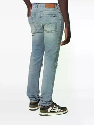 Amiri Distressed-effect Patched Jeans