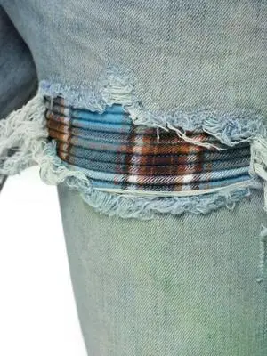 Amiri Distressed-effect Patched Jeans