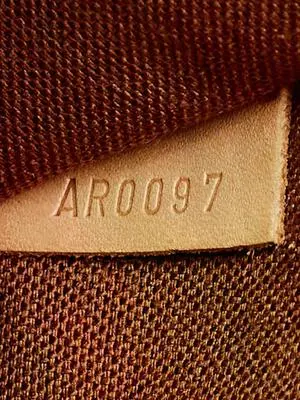 LOUIS VUITTON Riveting Monogram Tote Bag