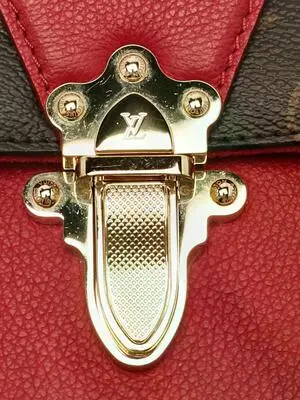 LOUIS VUITTON Victoire Monogram Shoulder Bag - Brown