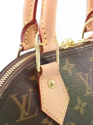LOUIS VUITTON Alma Bb Monogram Handbag