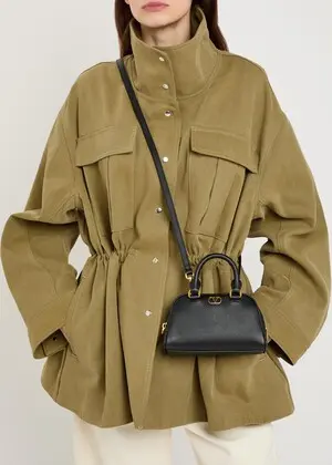 Valentino Garavani Vlogo Mini Pebbled Leather Top Handle Bag