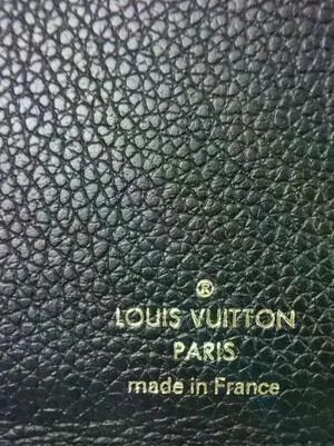 LOUIS VUITTON Victorine Monogram Empreinte Wallet - Black