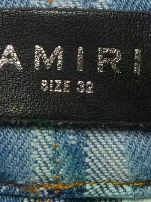 Amiri Logo-jacquard Snap-off Jeans