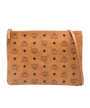 Mcm Logo Patterned Zipped Clutch Bag