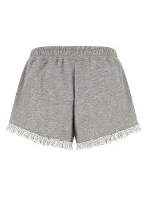 GANNI Isoli Cotton Jersey Shorts With Lace Trim