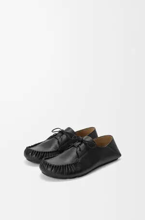 Loewe Wearing Loafers Over Other Shoes