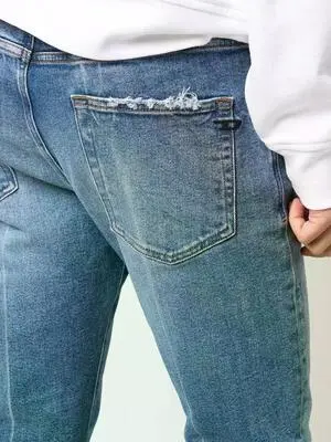 DIESEL® Whiskering Effect Slim-fit Jeans