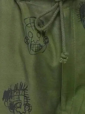 JUNYA WATANABE COMME DES GARCONS Jean-michel Basquiat-print Cropped Jumpsuit