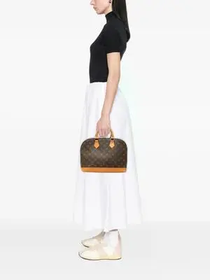 LOUIS VUITTON Monogram Alma Pm Handbag