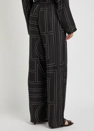 TOTEME Logo-monogrammed Wide-leg Silk Trousers