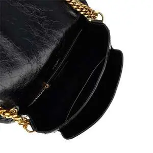 Saint Laurent Quilted Leather Shoulder Bag With Cassandre Logo - Black