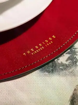 THE BRIDGE Logo-print Leather Placemat
