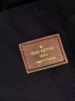 LOUIS VUITTON Irene Handbag Monogram Embossed Suede And Patent Shoulder Bag
