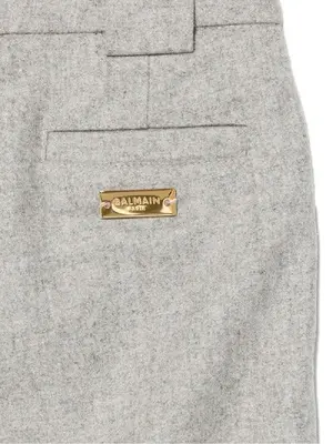 Balmain Pleated Logo-plaque Wool Trousers