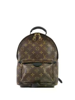 Louis Vuitton Gold Tone Backpacks