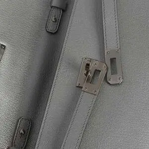 Hermès Argent Metallic Chevre Chamkilight Kelly Wallet To Go - Silver