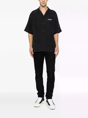 Amiri Coated Distressed Effect Jeans