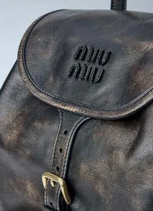 Miu Miu Leather Backpack With Buckle Detail - Multicolor