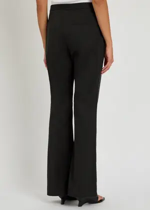 Vince Flared-leg Stretch-cotton Trousers