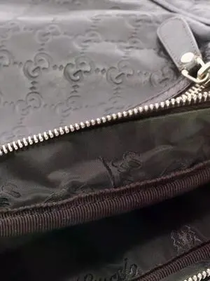 Gucci Gg Embossed Leather Shoulder Bag