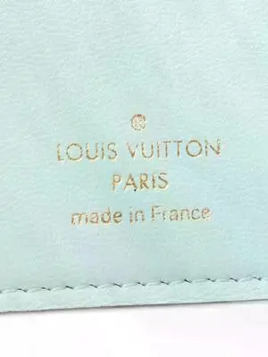 LOUIS VUITTON 2000s Capucines -vertical Bi-fold Wallet