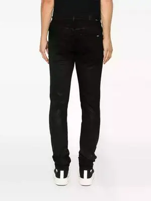 Amiri Distressed-effect Coated Jeans