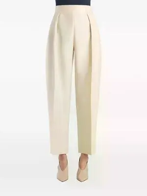 Khaite Somera Pleated Pressed-crease Trousers - Neutrals