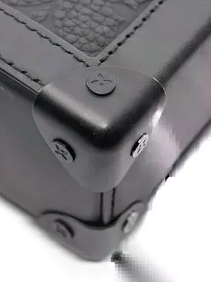 LOUIS VUITTON Vertical Trunk Messenger Bag