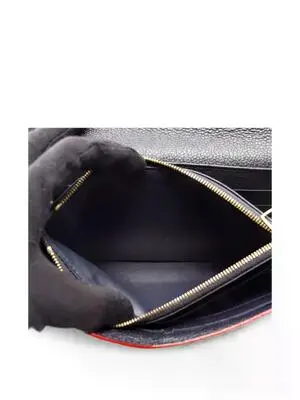 LOUIS VUITTON 2021s Monogram Empreinte Sarah Wallet