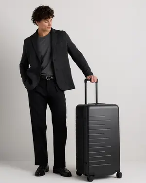 Quince Trunk Check-in Suitcase - Black