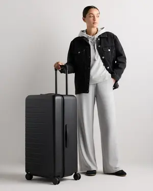 Quince Trunk Check-in Suitcase - Black