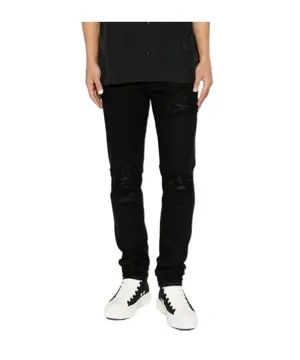 Amiri Distressed-effect Coated Jeans