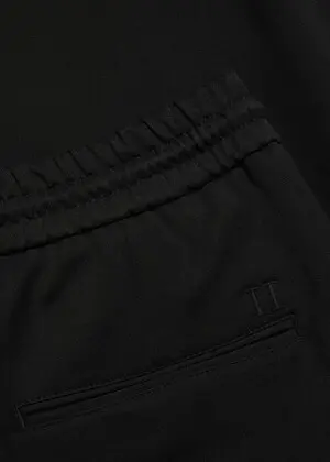 LES DEUX Tapered-leg Trousers - Black