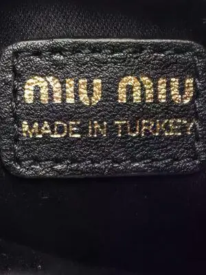 Miu Miu Matelassé Leather Shoulder Bag With Tassels