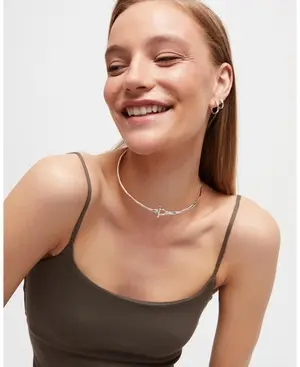 UNODE50 Rigid Necklace With Front Clasp Plated In Sterling With White Topaz