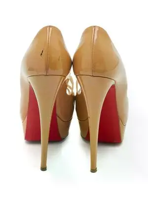 CHRISTIAN LOUBOUTIN Mademoi Criss-cross Platform Pumps