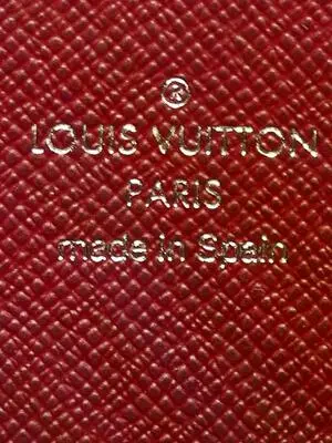 LOUIS VUITTON Zippy Leather Wallet
