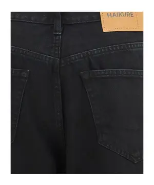 HAIKURE Logo Patch Pants