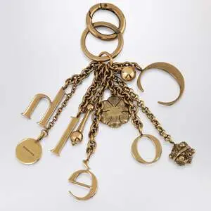 Chloé Bag Charm With Logo And Symbols In Vintage Gold Brass - Silver