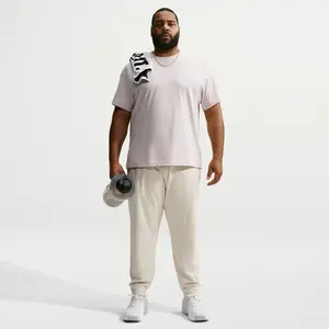 Nike Dri-fit Primary Short-sleeve Versatile Top - Brown